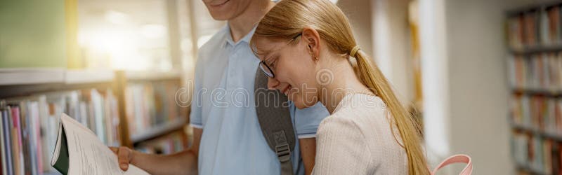 Two Friends Student Chooses Books while Standing in the University ...