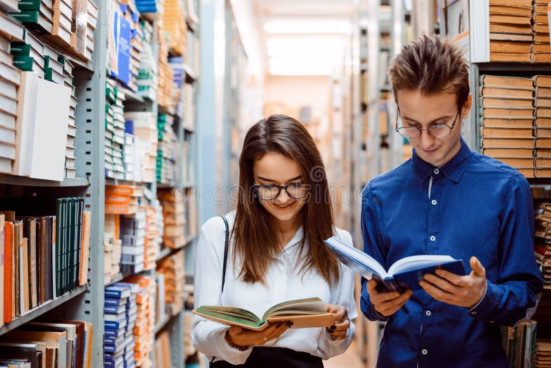Students Reading Books in Library Stock Photo - Image of campus ...