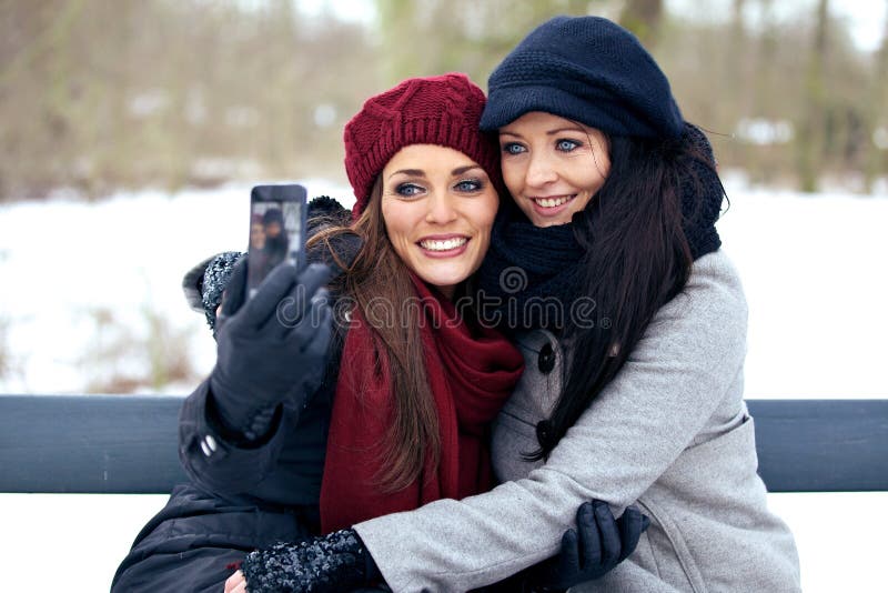 Two Friends Taking Picture of Themselves Stock Photo - Image of female ...