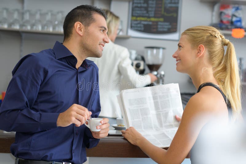 Two Friends Talking in Cafe Stock Photo - Image of cafe, male: 99180422