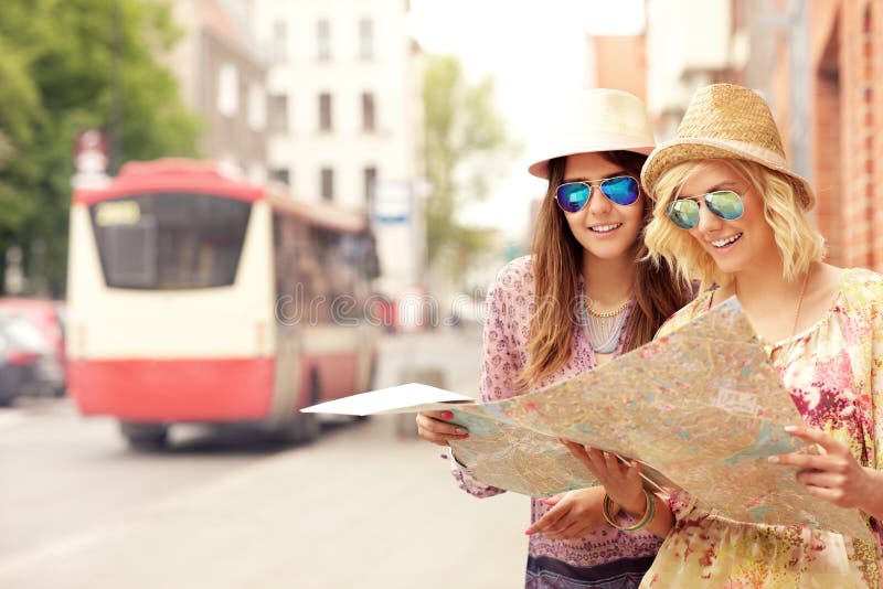 Two Friends Using Map in the City Stock Image - Image of connection ...