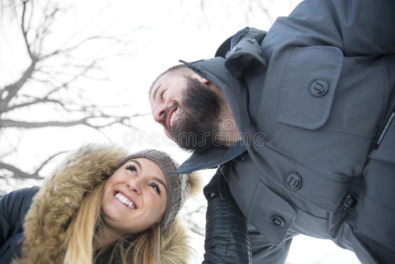 Friends in Winter Coats Sitting Fire in Forest Stock Photo - Image of ...