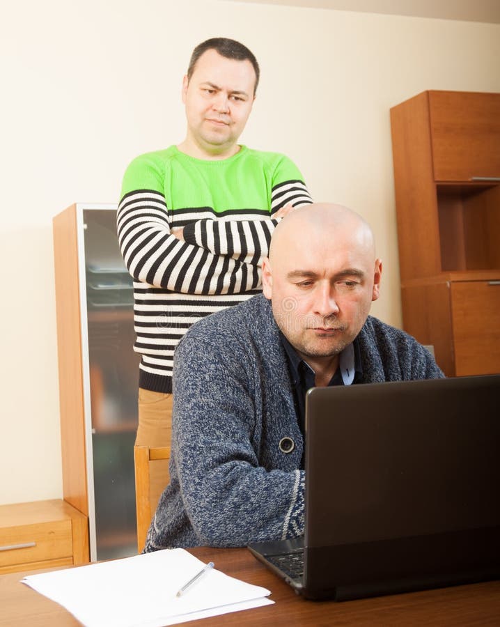 Two Friends Working on Laptop Stock Image - Image of computer, adult ...
