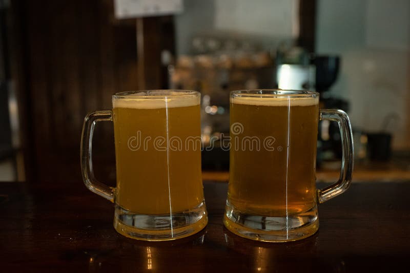 Two beer cups stock image. Image of celebration, gold - 28639785