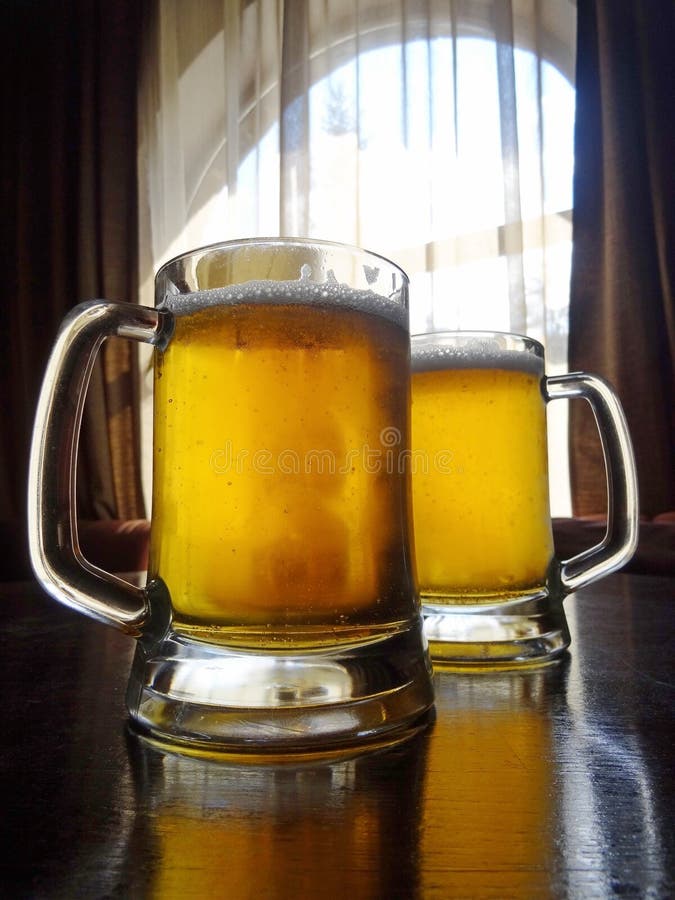 Two Full Mugs of Classic Light Beer Detailed Stock Image - Image of ...