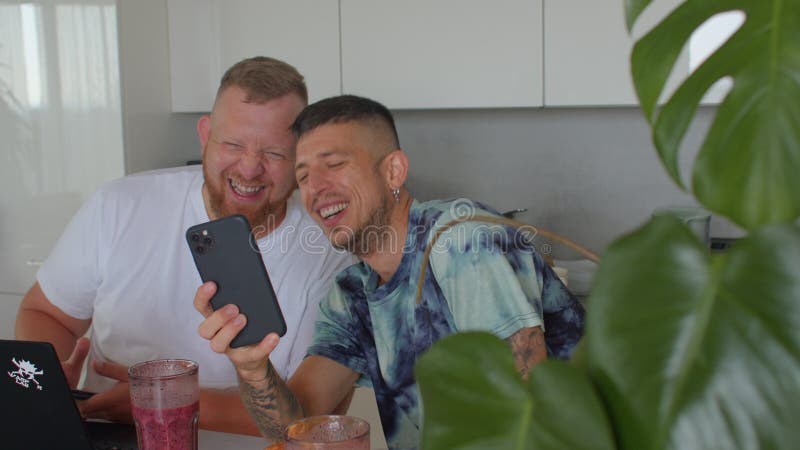 Two Funny Guys Make Video Call Using Phone he Holds Gadget, Uses Front ...