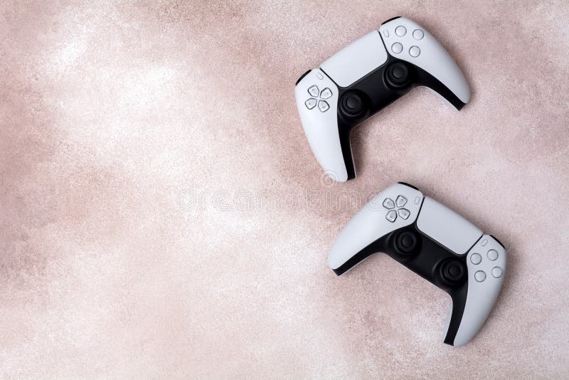 Two Game Controllers on a Light Background. White Joystick for Computer ...