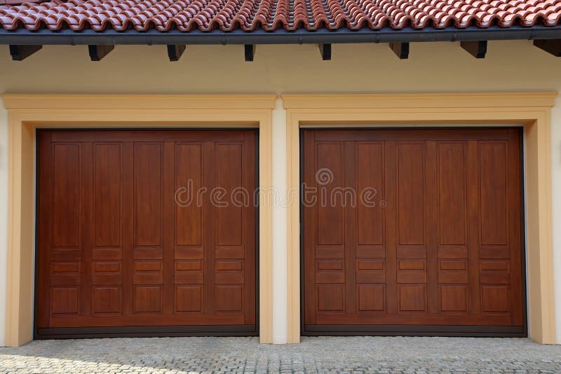 Double Garage Doors stock image. Image of blocks, attached - 13954855