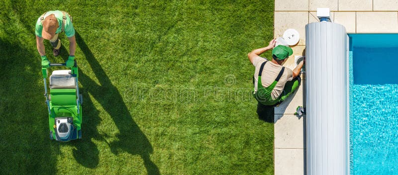 Two Garden and Landscaping Workers Performing Backyard Maintenance ...