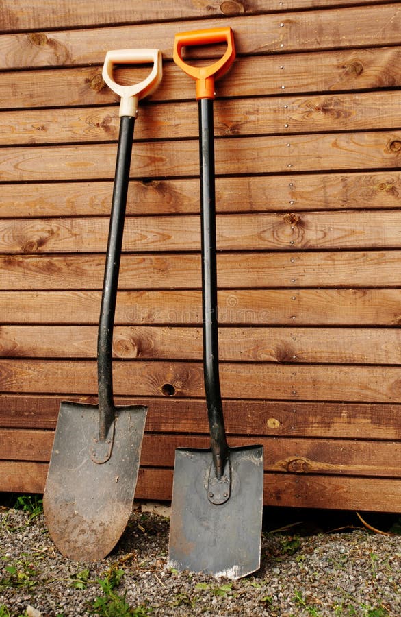 Two garden shovels stock photo. Image of hammer, landscape - 26131082