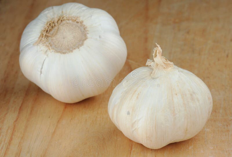 Two garlic stock photo. Image of board, head, meal, seasoning - 13214728