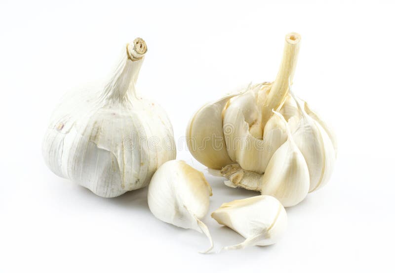 Two Garlic Pieces and Cloves on a White Background Stock Image - Image ...