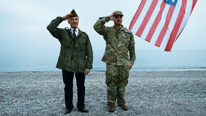 Two Generation of Soldier Paying Tribute To USA Stock Image - Image of ...