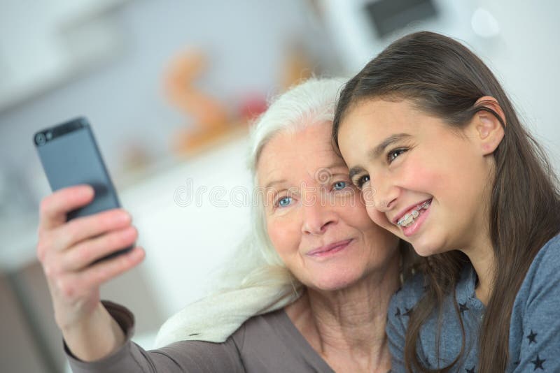 Two Generation Women Making Funny Selfie Together Stock Image - Image ... Two Generation Women Making Funny Selfie Together Stock Image - Image ...