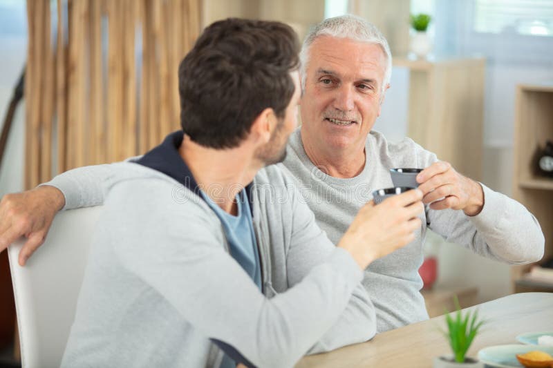 Two Generations Men Drinking Wine Together Stock Photo - Image of ...