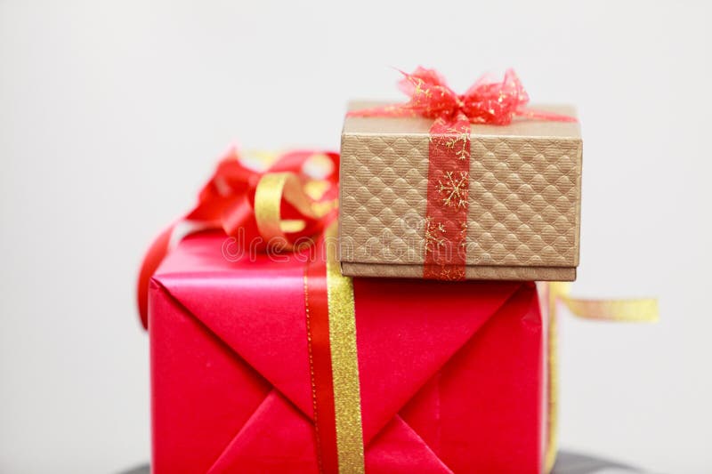 Two Gift Boxes Red and Golden Stock Photo - Image of package, greeting ...