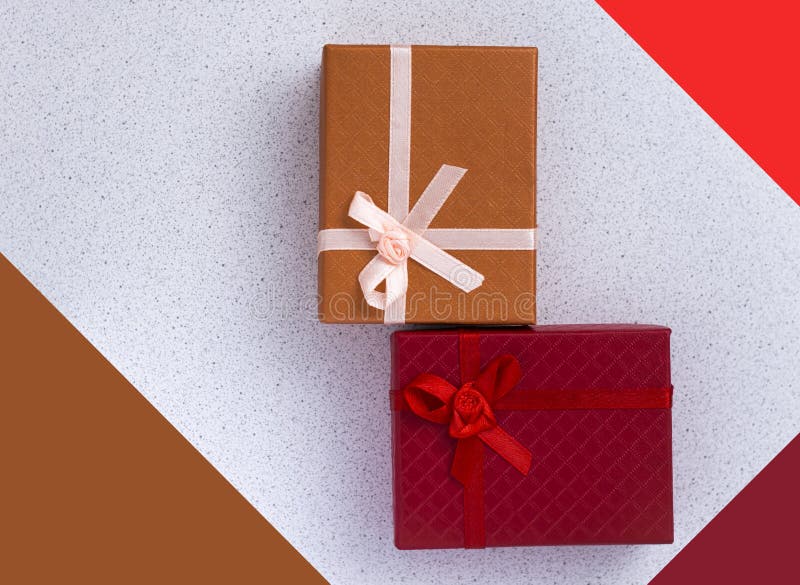 Two Gift Boxes in Red and Orange, with Bows Stock Image - Image of ...