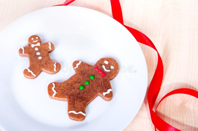 Two Gingerbread Men on a Plate. Stock Photo - Image of season, baked ...