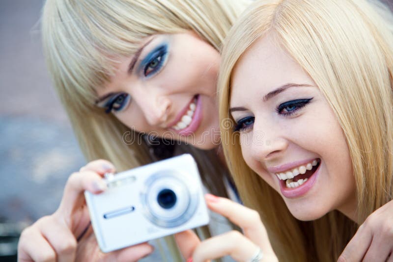 Two Girl Friends with a Photo Camera Stock Photo - Image of beauty ...