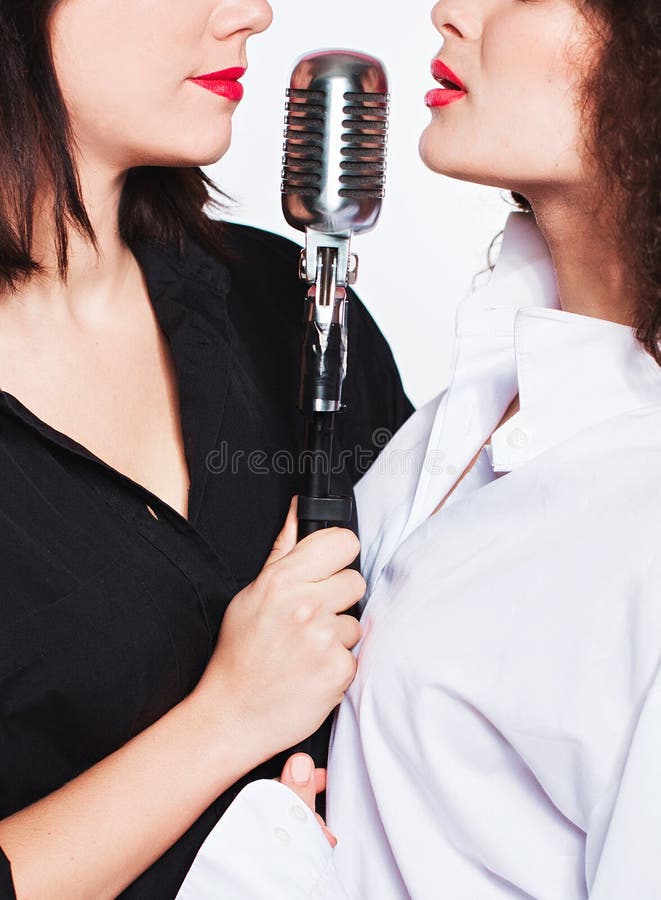 Two girl singers stock image. Image of adult, performing - 34699987
