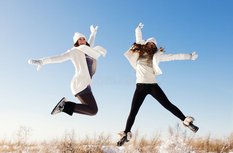 Two Girlfriends Have Fun and Enjoy Fresh Snow Stock Image - Image of ...