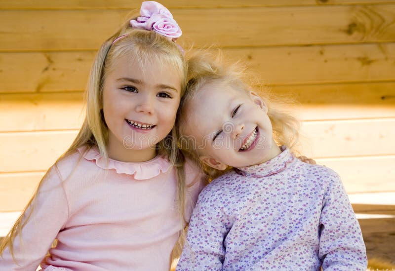 Two girls 2 stock image. Image of playful, blond, girls - 3853717