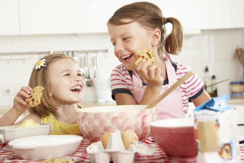 Two Girls Baking in Kitchen Stock Image - Image of butter, girl: 55897245
