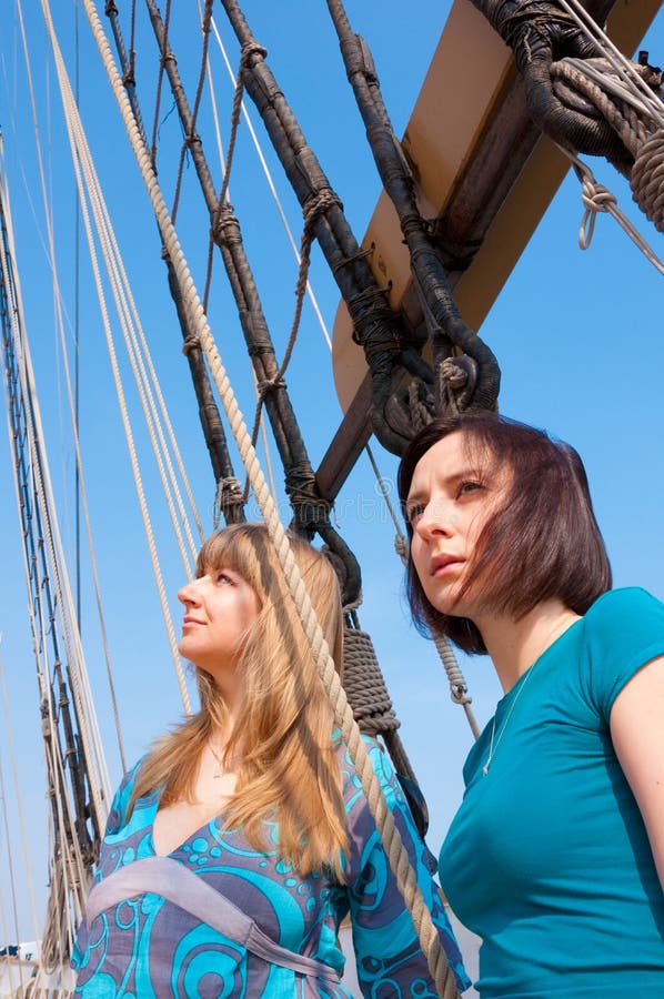 Two girls on a boat stock photo. Image of attractive - 13516652