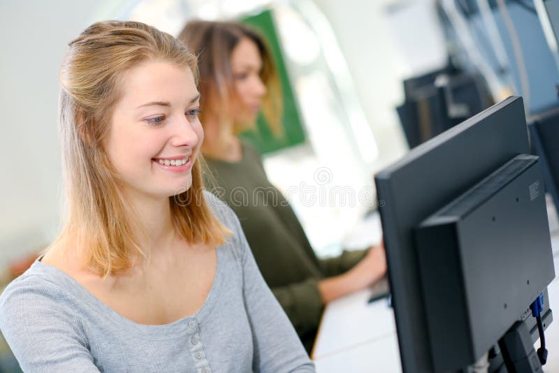Two Girls in Computer Class Stock Image - Image of technology, green ...