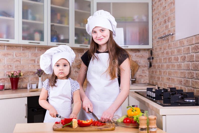 Two Girls Cooking Together at Home Stock Image - Image of home, family ...