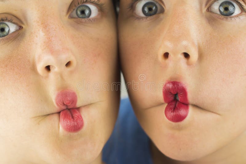 Two Girls Doing Fishlips stock image. Image of look, looking - 59054961