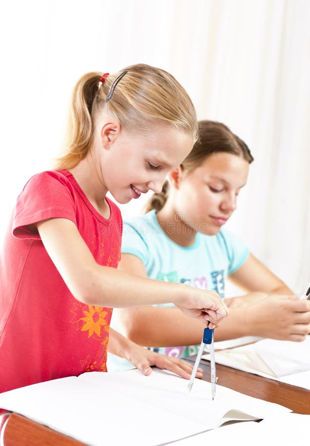 Kids doing homework. stock image. Image of photograph - 4246301