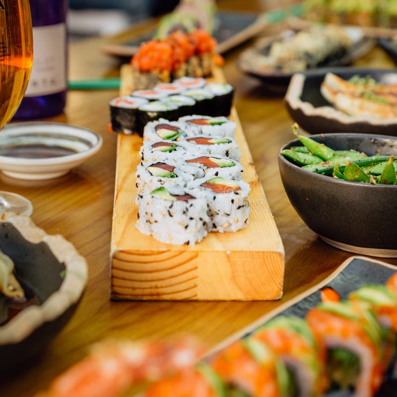 Two Girls Eating in a Sushi Restaurant in Summer Stock Image - Image of ...