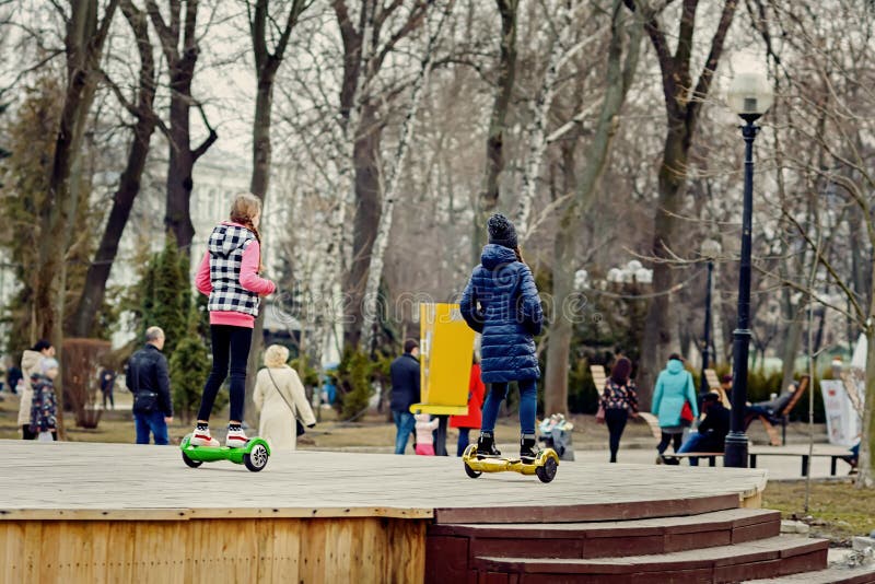 Two Girls on Electric Gyroboards Editorial Photo - Image of gyroscooter ...