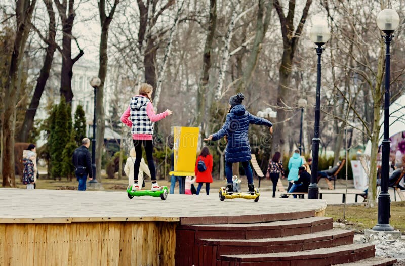 Two Girls on Electric Gyroboards Editorial Photo - Image of electrical ...