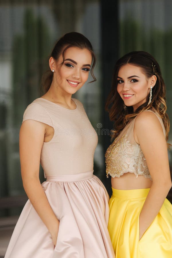 Two Girls in Evening Dress Show Their Makeup Stock Image - Image of ...