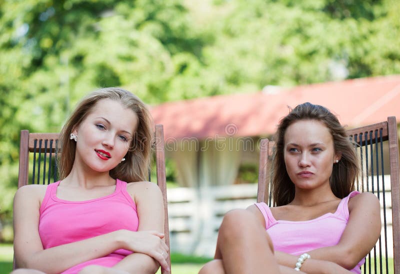 Two girls have a rest stock photo. Image of residence - 21329044