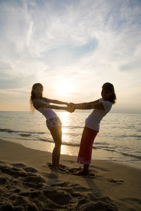Two Girls Having Fun at the Beach Stock Image - Image of relax ...