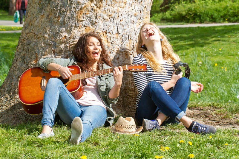 Two Girls Having Fun with Her Instruments Stock Photo - Image of ...