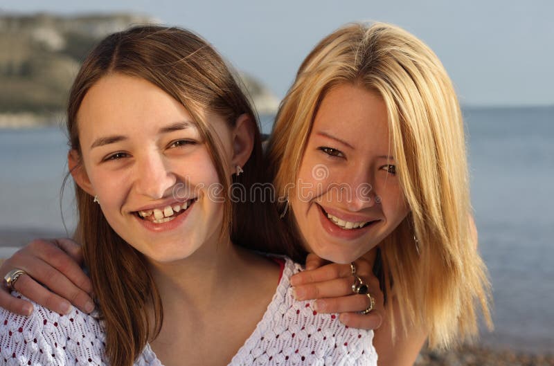 Two Girls Having Fun on Holiday. Stock Image - Image of people, face ...
