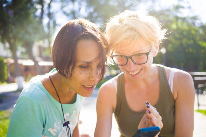 Two Girls Having Fun in the Park. Stock Image - Image of laughing ...