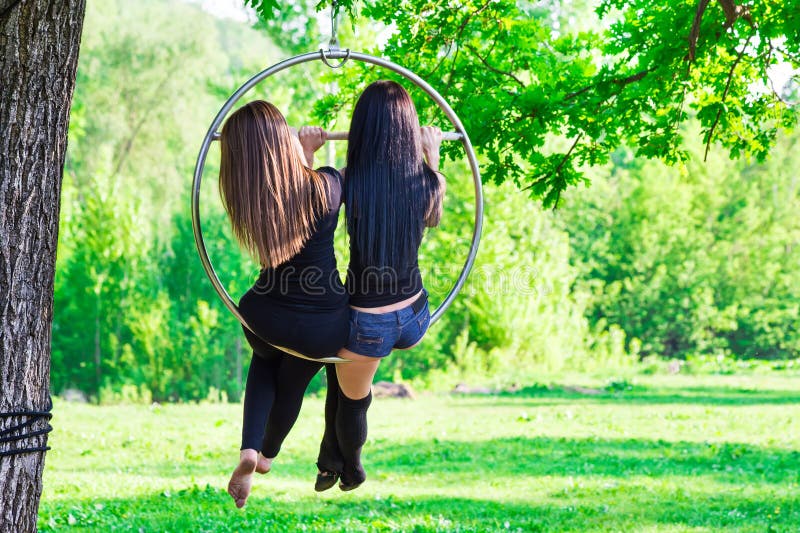 Two girls on the hoop stock image. Image of grace, girls - 71502687