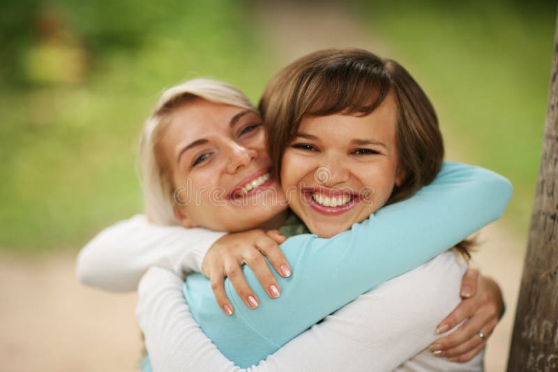 Two girls hugging stock image. Image of enjoy, girls - 10340355