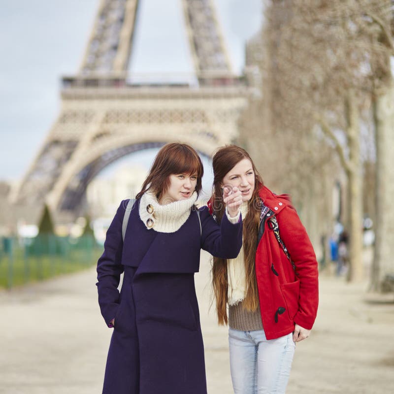 Two Girls in Paris Near the Eiffel Tower Stock Image - Image of ...
