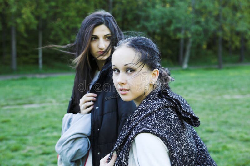 Two girls in park stock photo. Image of adult, happiness - 98827304