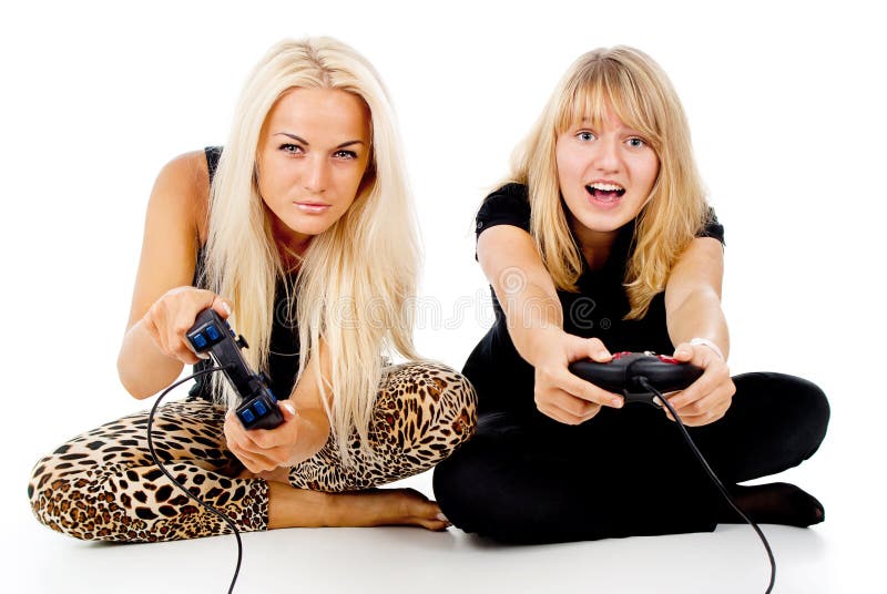 Women playing video game stock photo. Image of console - 20812926