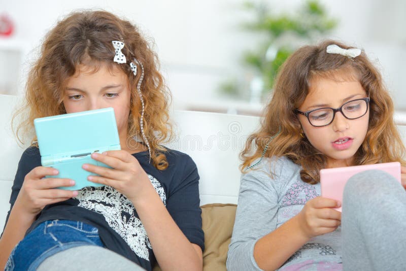 Two Girls Playing Computer Games Stock Image - Image of education ...