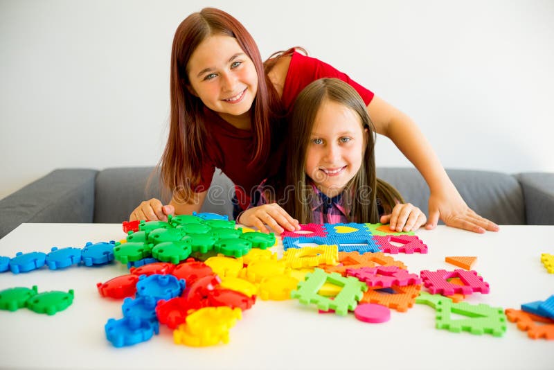 Two Girls Playing with Construction Blocks Stock Photo - Image of girl ...