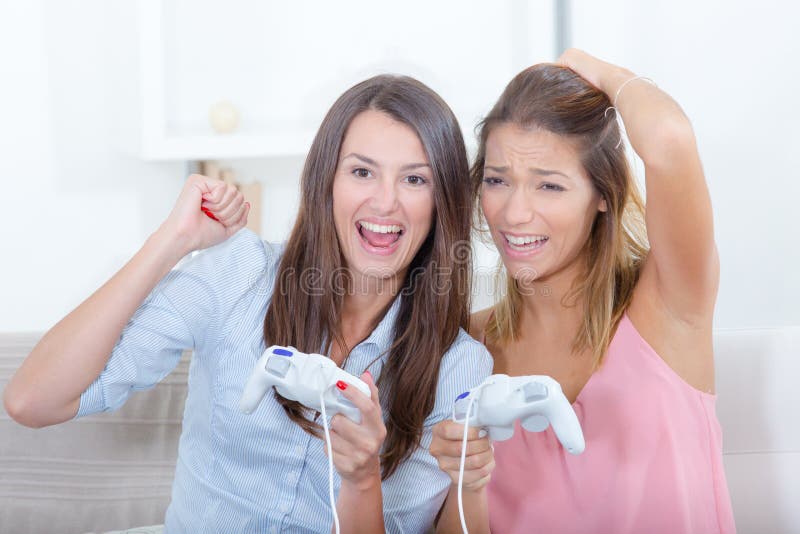Two Girls Playing Videogames Stock Image - Image of siblings, member ...