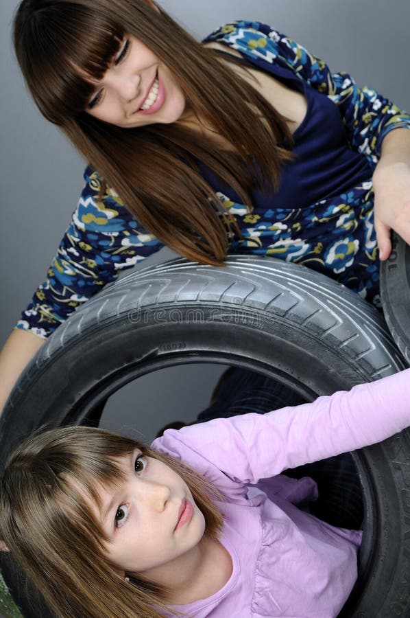 Two Girls Posing Tires Stock Photos - Free & Royalty-Free Stock Photos ...